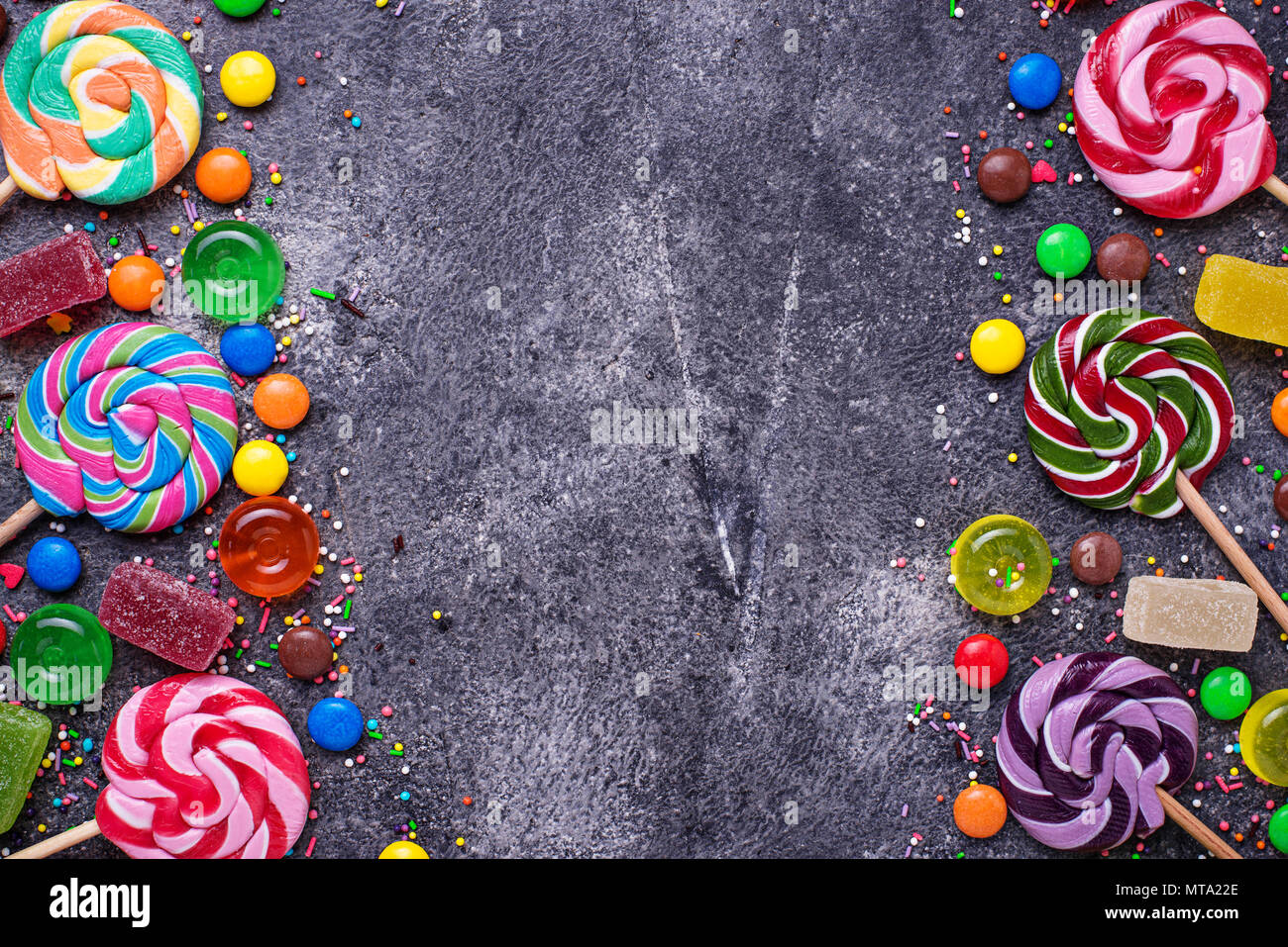 Assortment of colorful candies and lollipops. Sweet background Stock ...