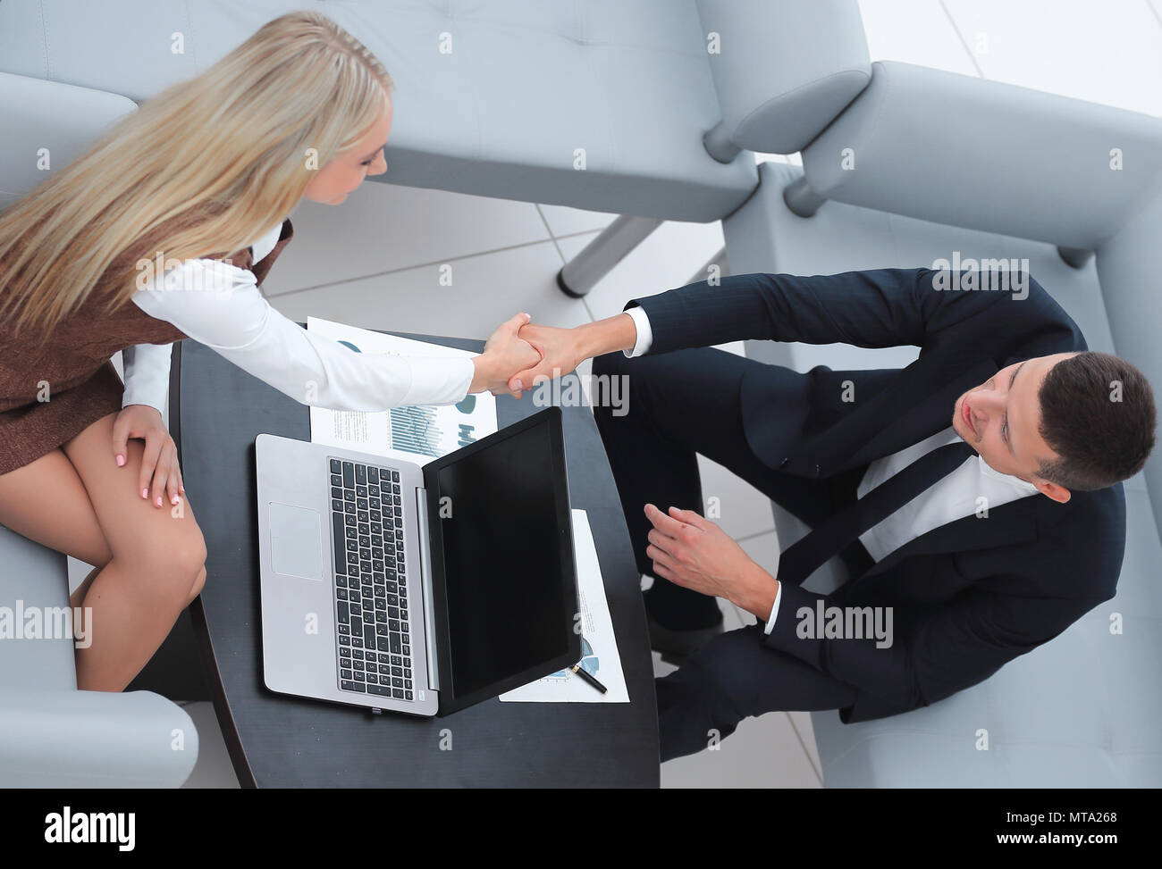 handshake Manager and the client Stock Photo - Alamy