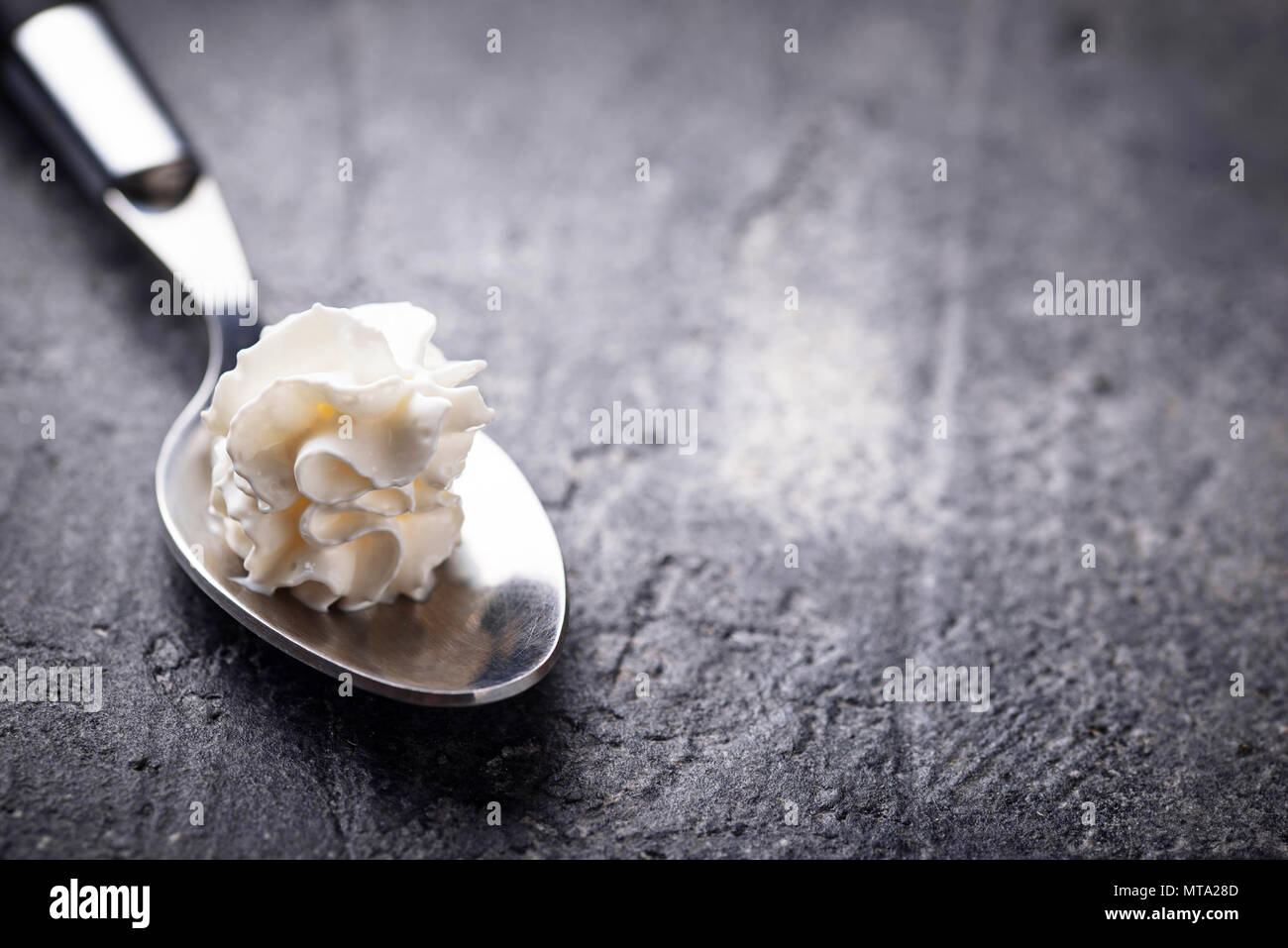Whipped cream on a spoon Stock Photo - Alamy