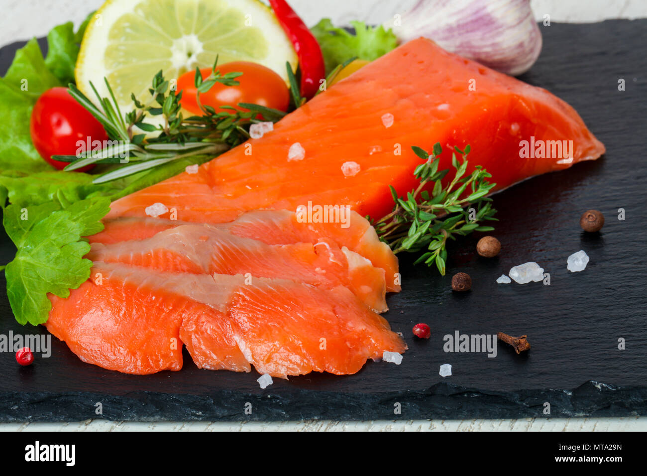 Raw trout fillet with salt and spices Stock Photo - Alamy