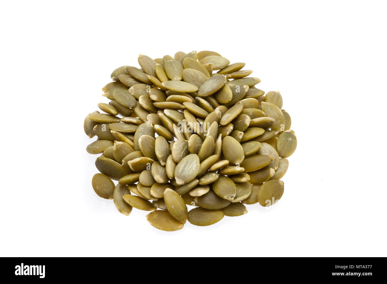 Sunflower seeds in the center, in the shape of a circle, on a white ...