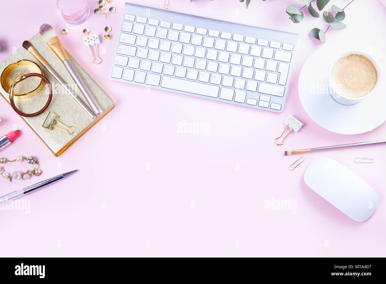 Flat lay home office workspace - white modern keyboard with female ...