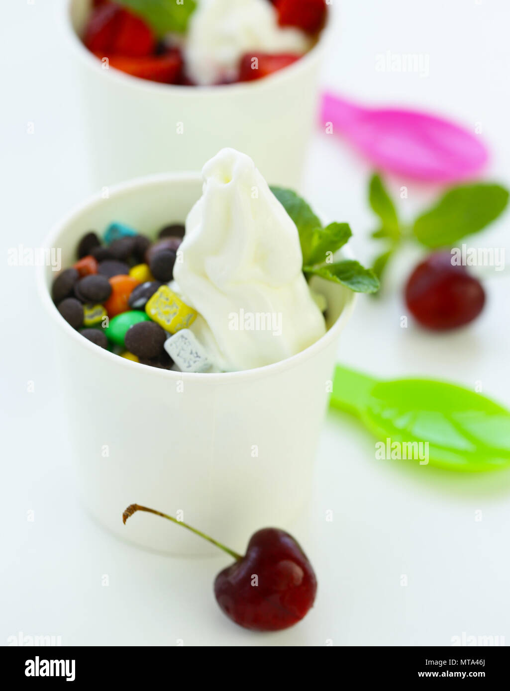 frozen yogurt with berries and sweets - summer dessert Stock Photo - Alamy