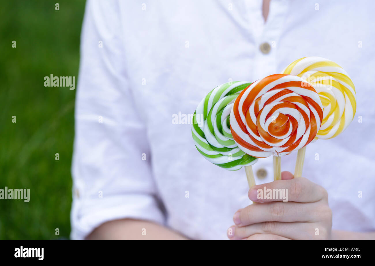 Boy child with lollipop lolipop candy hi-res stock photography and ...