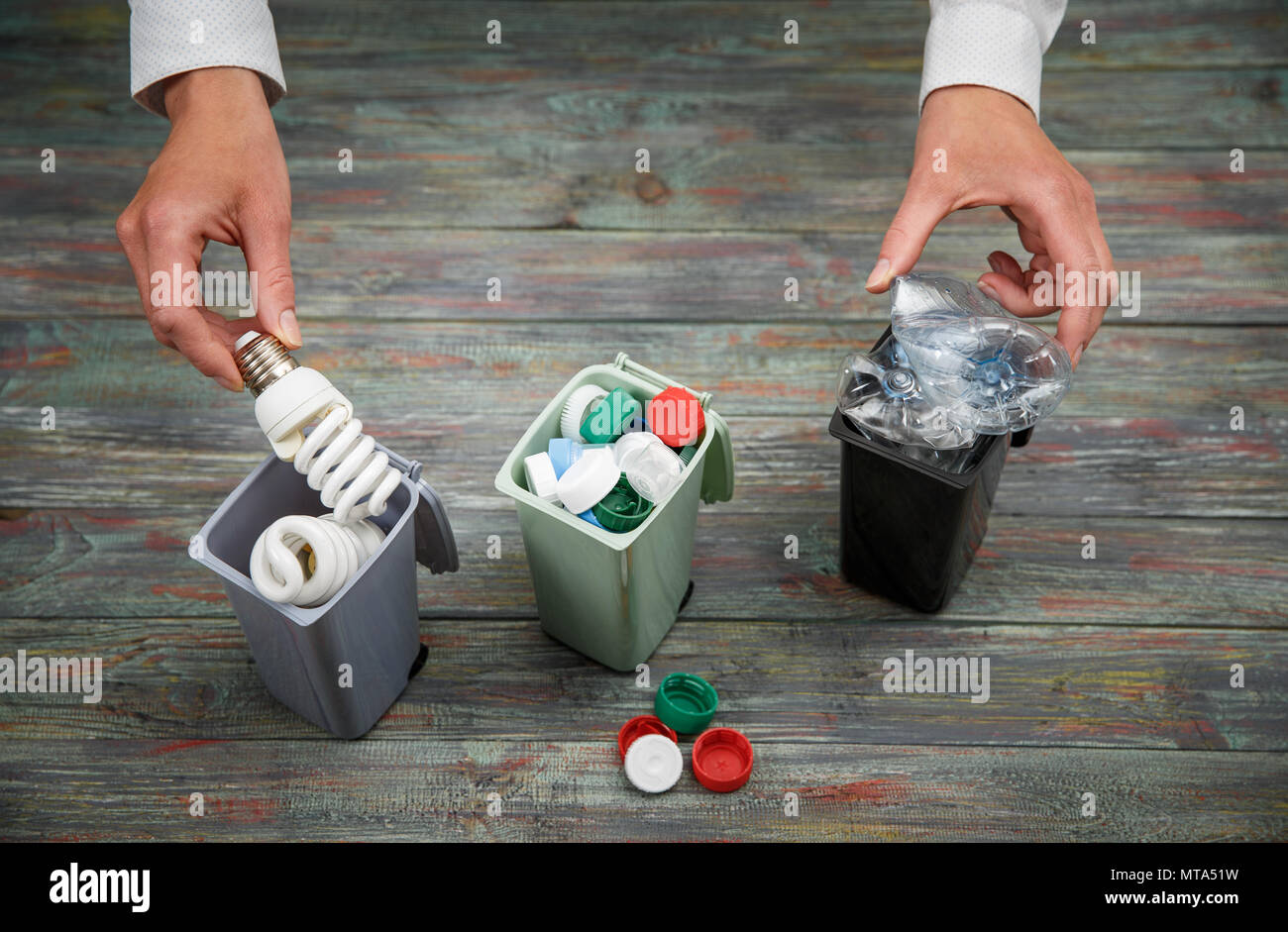 Ecology concept, a lot of recyclable objects in containers on the ...