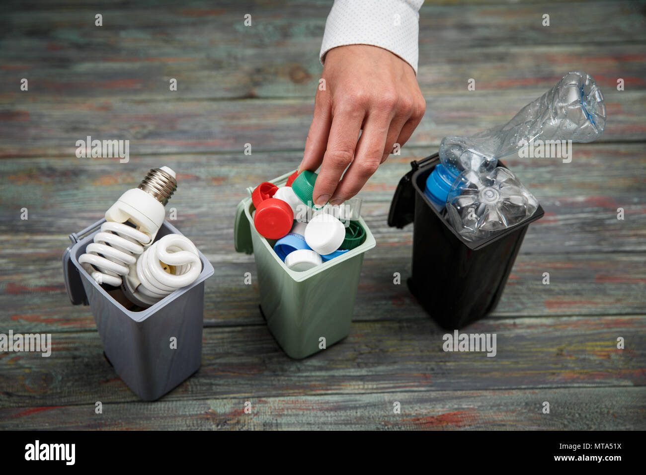 Ecology concept, a lot of recyclable objects in containers on the ...