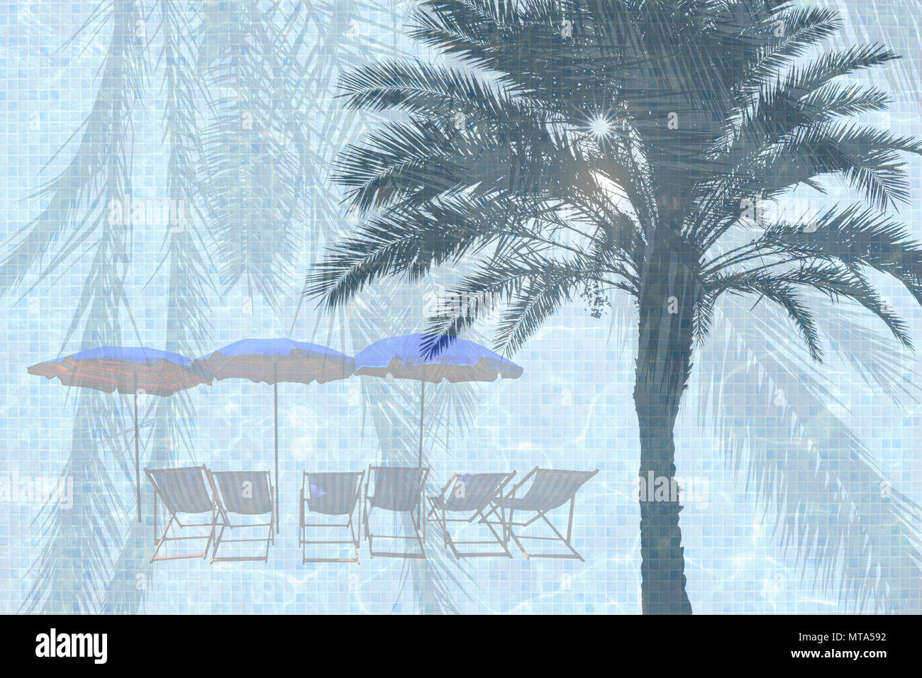 Sun lounge chairs and blue parasols on turquoise blue pool water ...