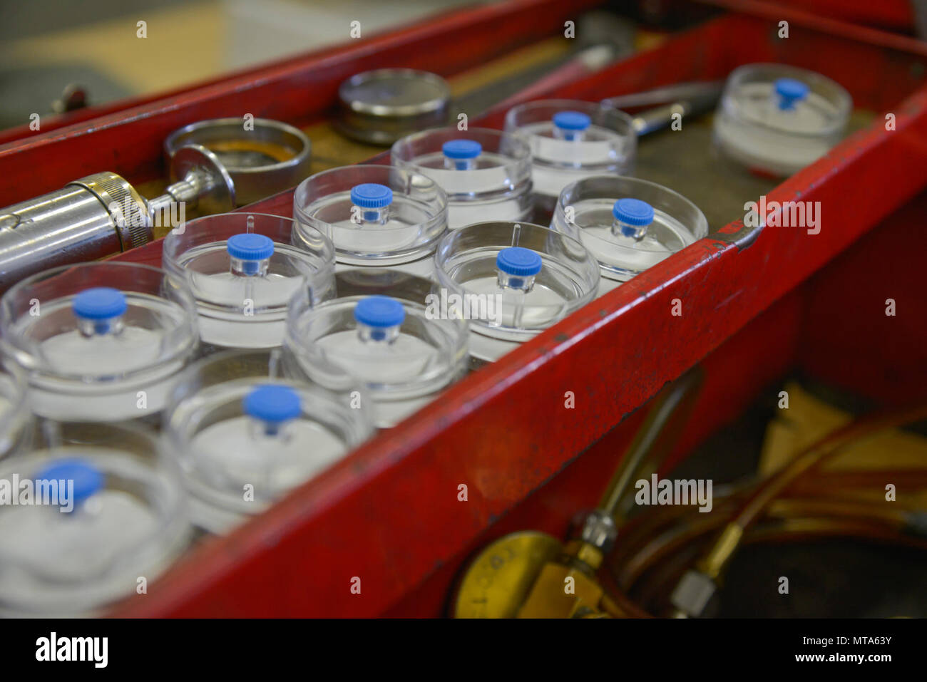 Single weight monitors sit in a box in the fuel laboratory at Yokota ...