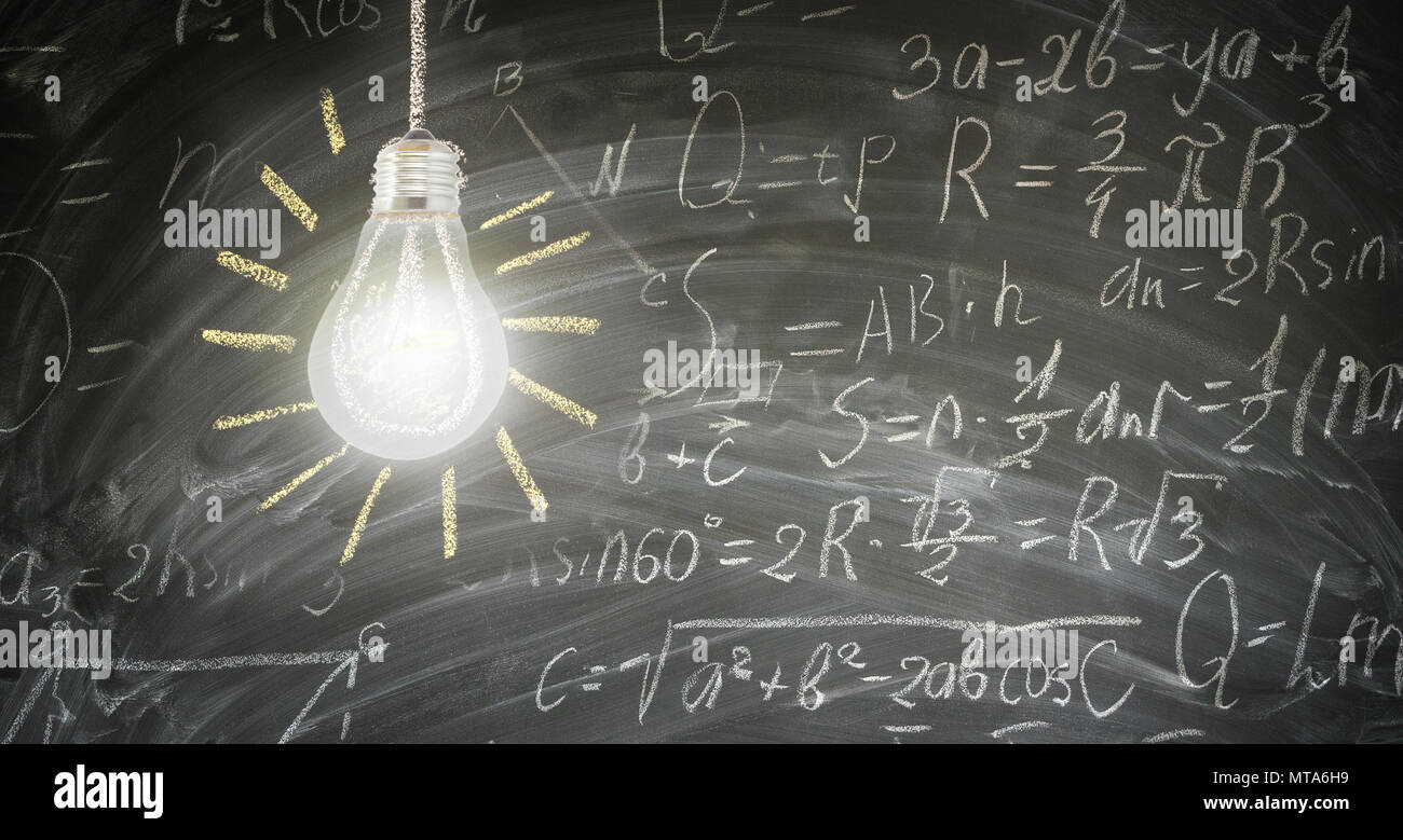 idea concept with bright glowing light bulb on blackboard with math ...