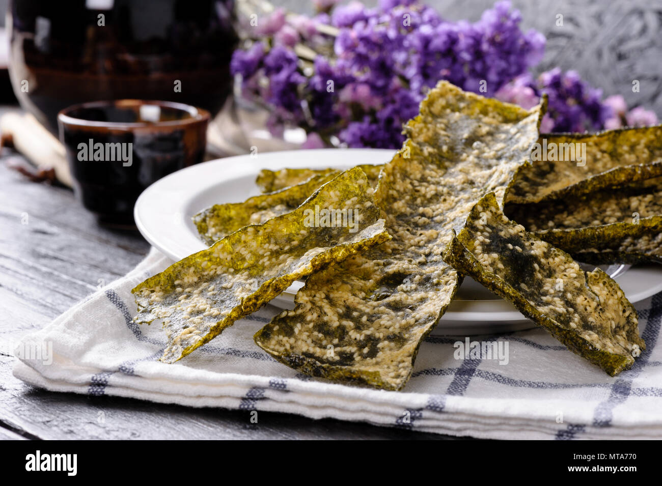 Deep fired seaweed sticks with white sesame Stock Photo - Alamy