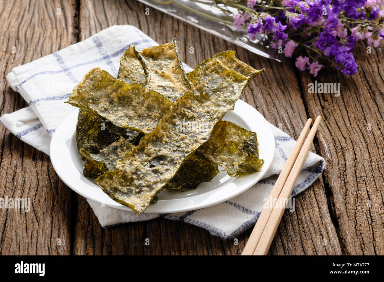 Deep fired seaweed sticks with white sesame Stock Photo - Alamy