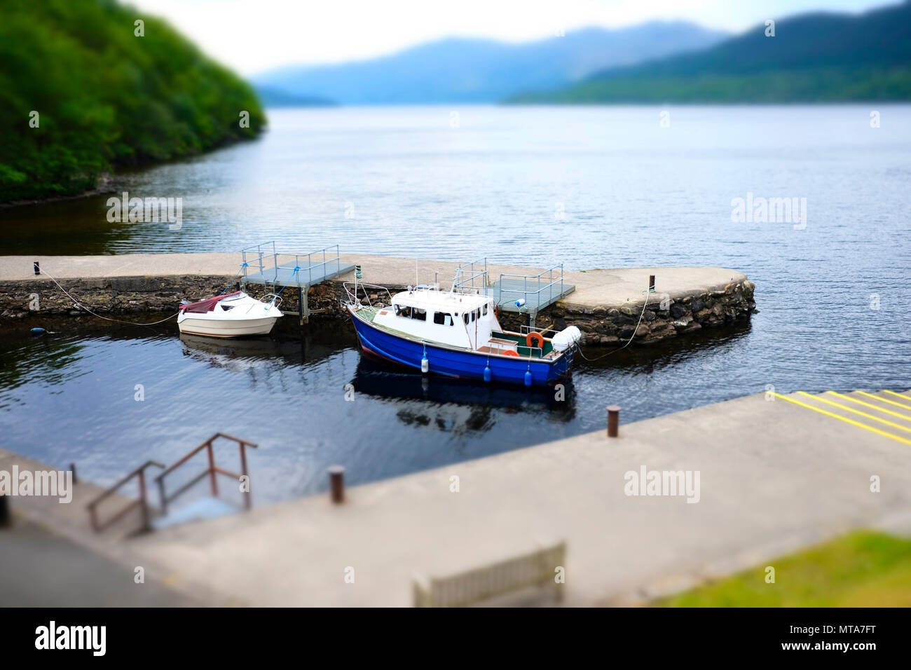 Boats moored harbour harbour stone pier jetty water two miniature ...