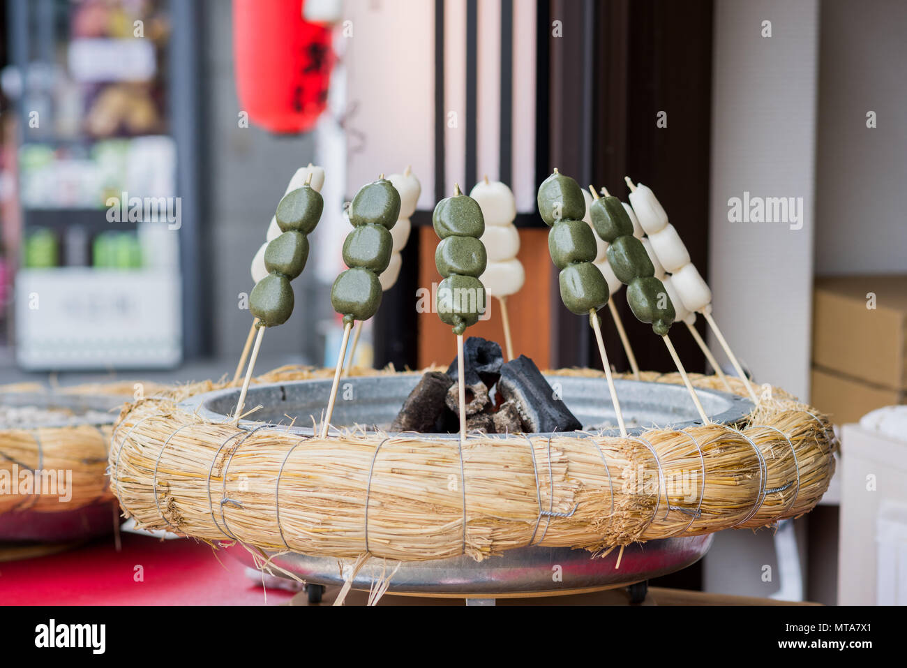 Japanese traditional dessert, Dango in street martket, Japanese ...