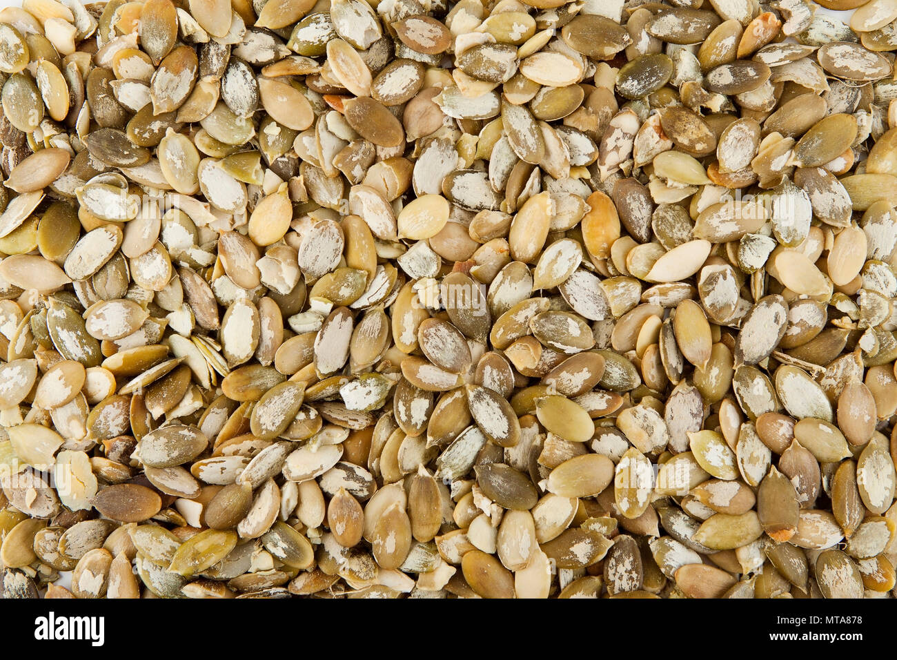 pumpkin seeds background close up Stock Photo - Alamy