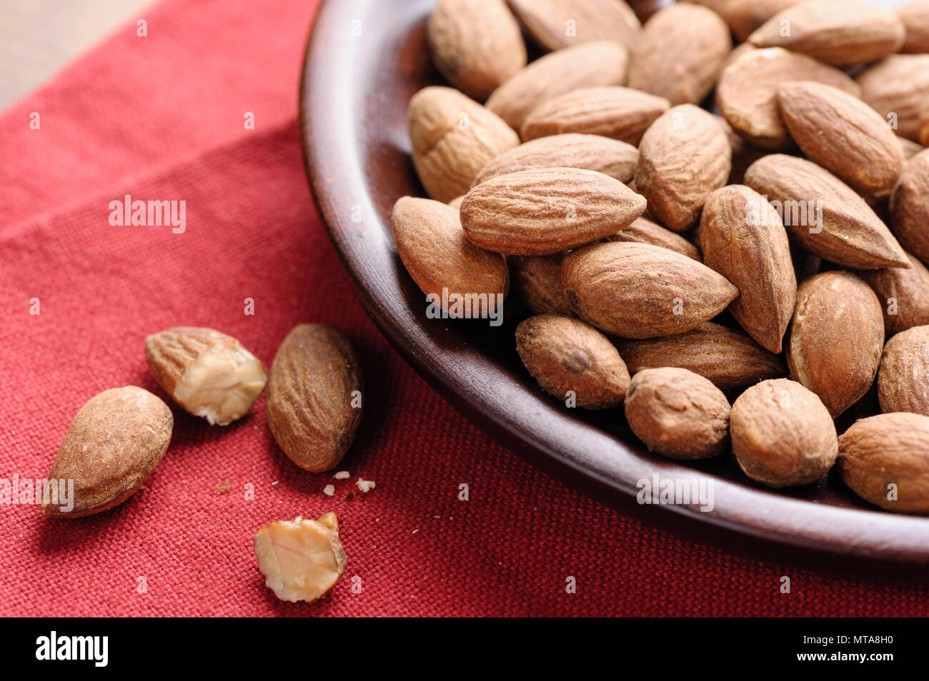 closeup heap of roasted salted almonds, peeled almonds Stock Photo - Alamy