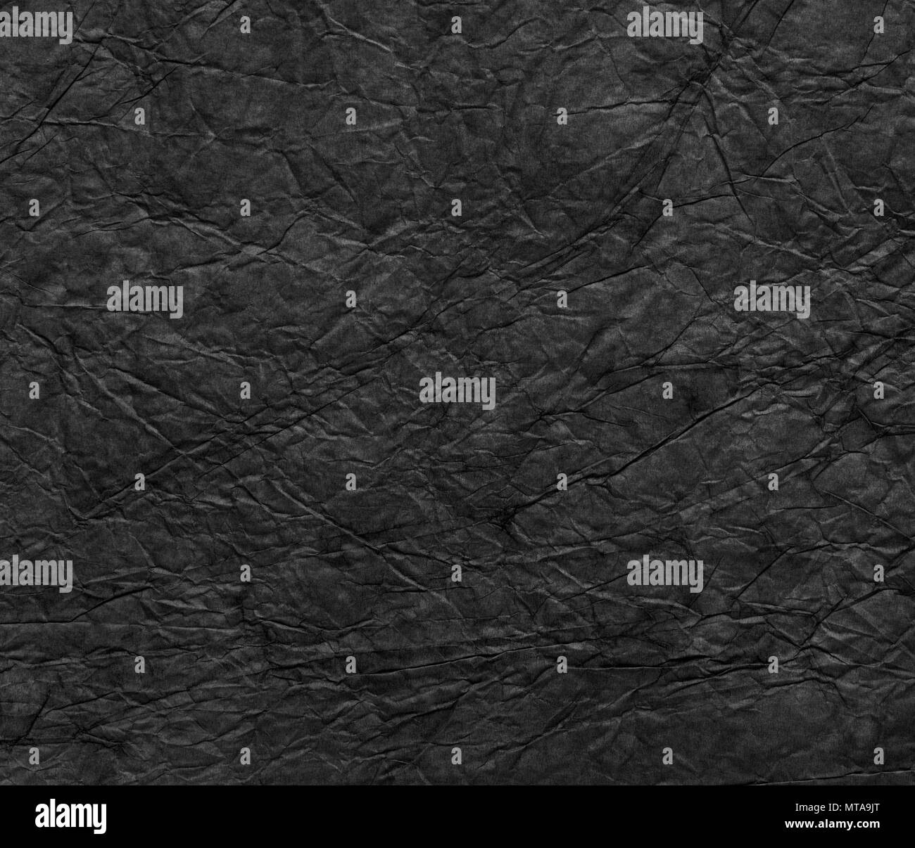 Black crumpled paper texture background Stock Photo - Alamy
