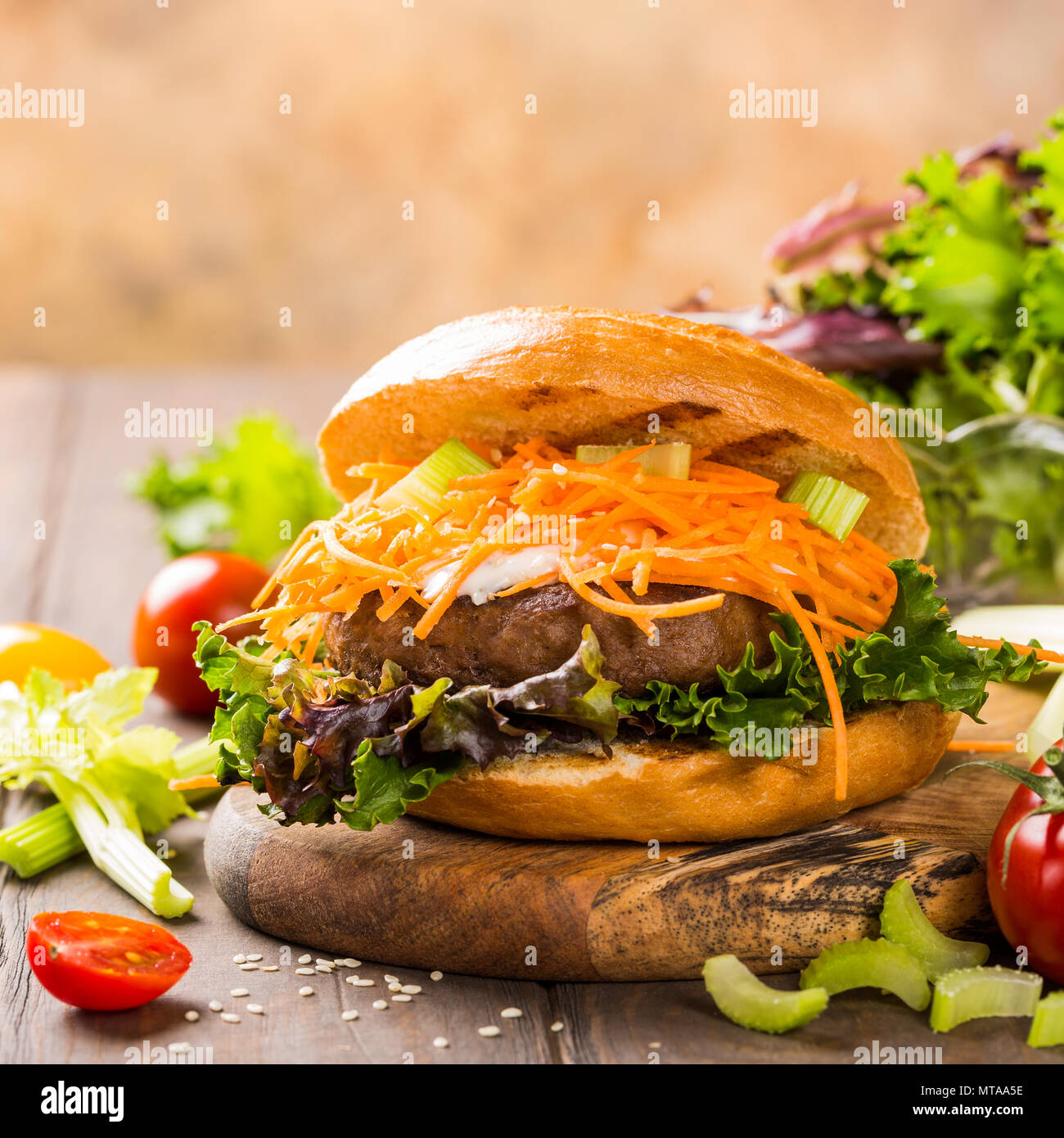 Delicious bagel burger Stock Photo - Alamy