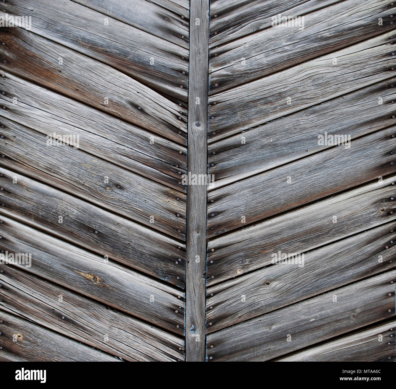 Old wooden gate detail with herringbone pattern Stock Photo - Alamy