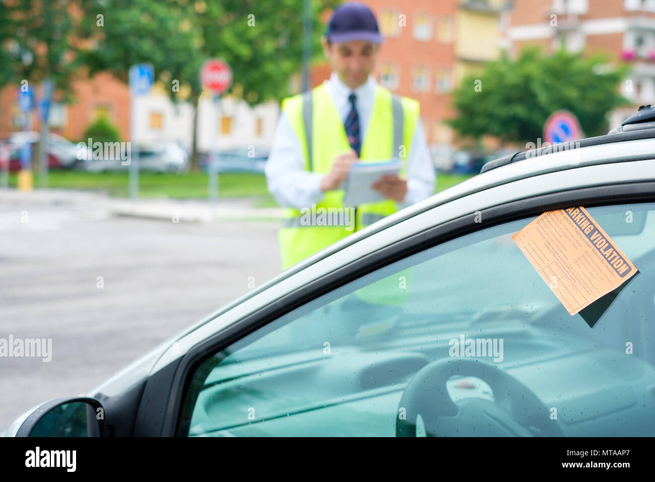 Parking lot attendant hi-res stock photography and images - Alamy