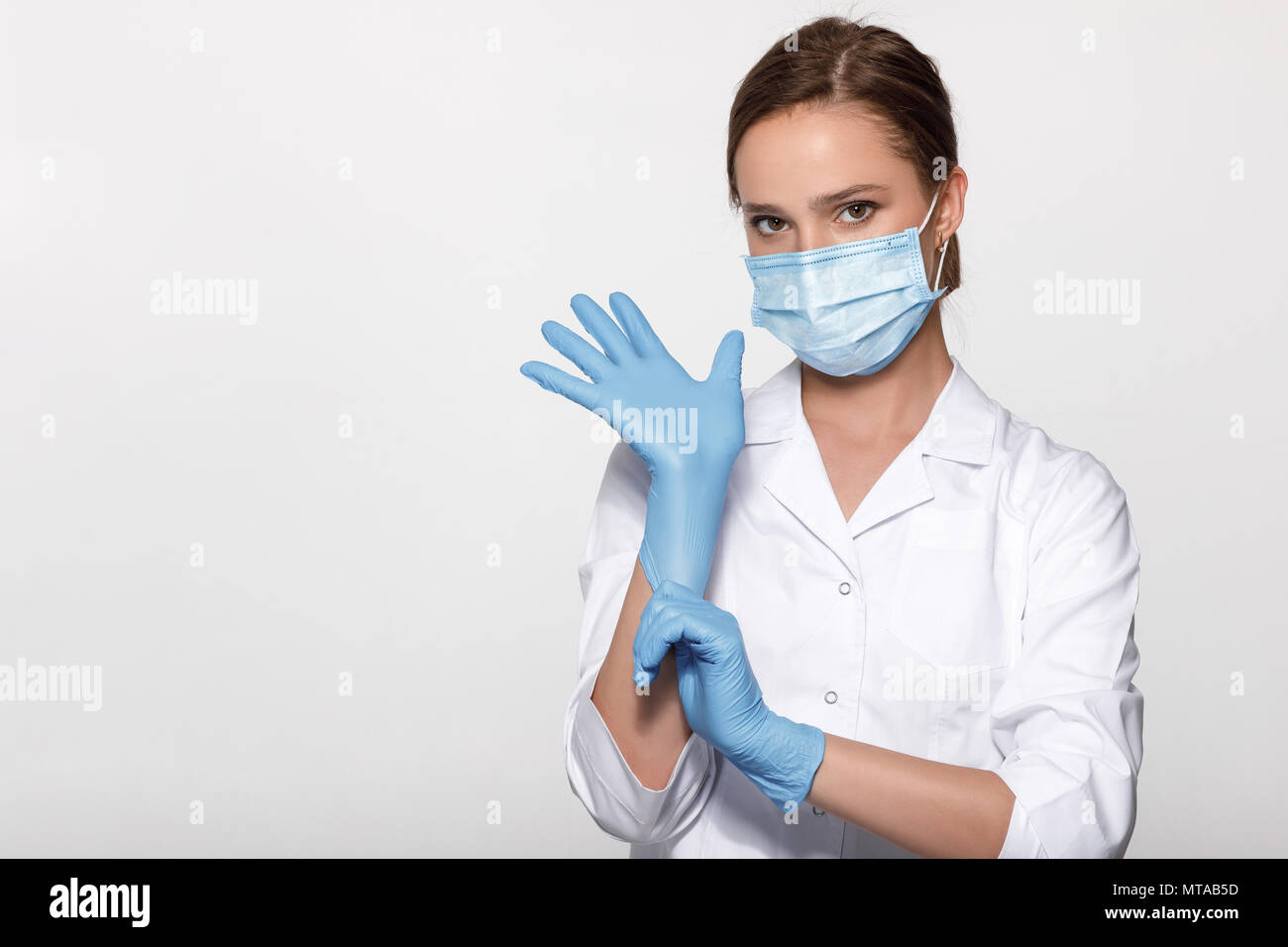 doctor wearing mask and gloves Stock Photo - Alamy