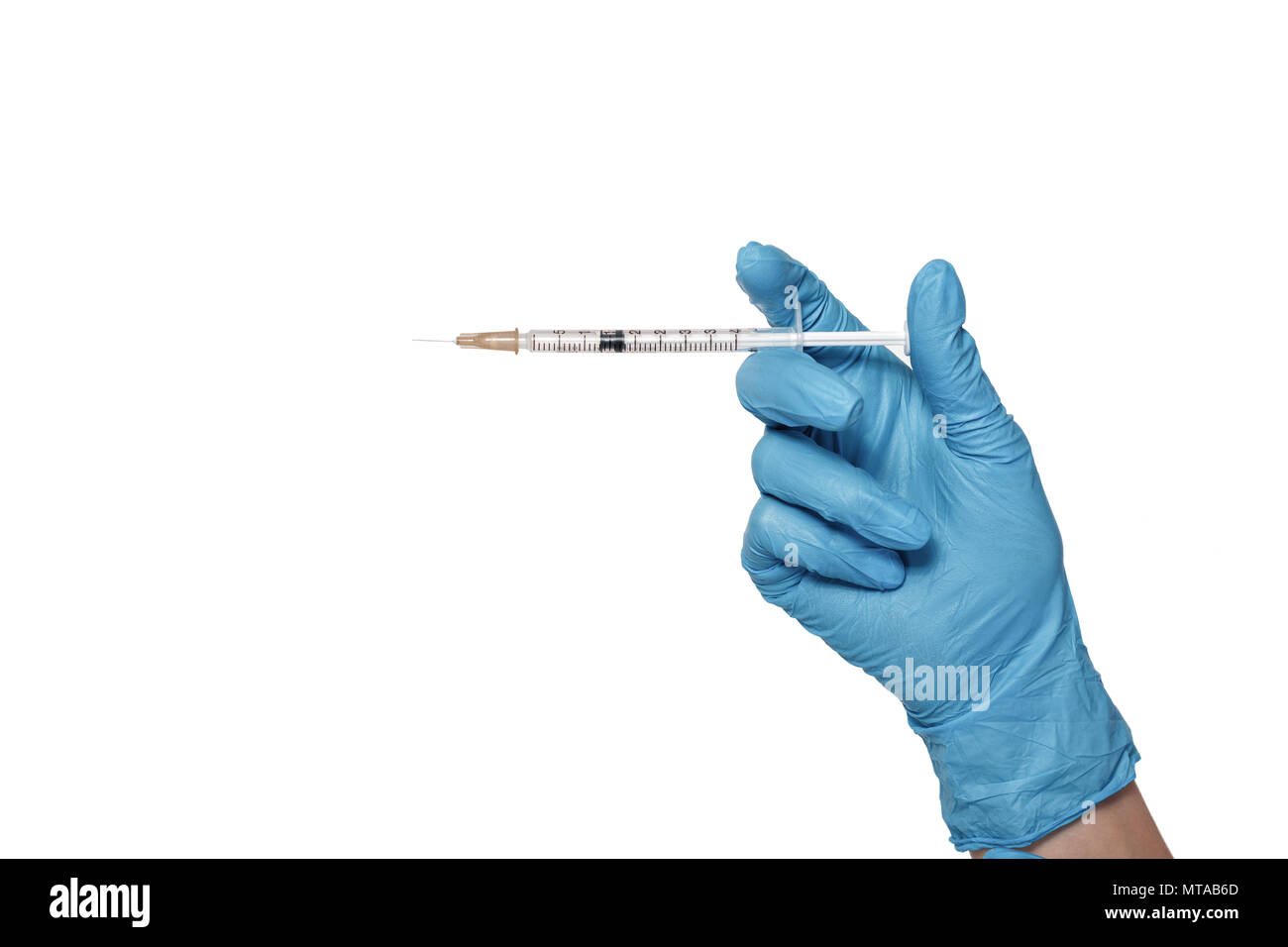 Syringe in hand vaccination Cut Out Stock Images & Pictures - Alamy