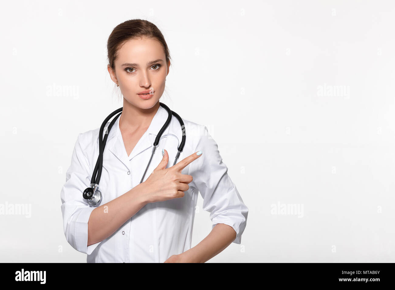 woman doctor showing something Stock Photo - Alamy