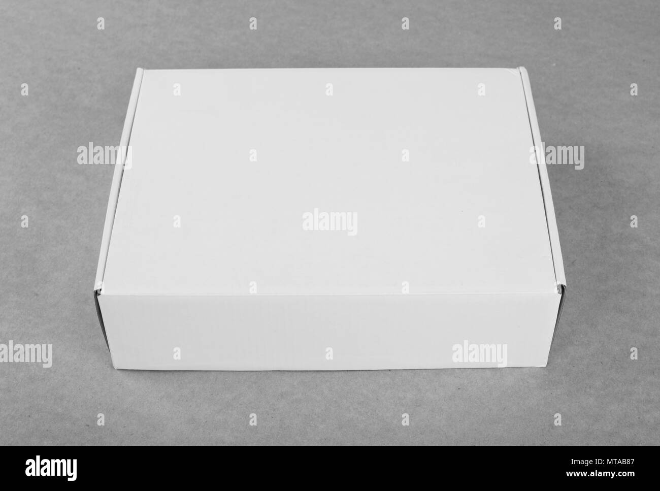 Closed white cardboard box for packaging on a white background Stock ...