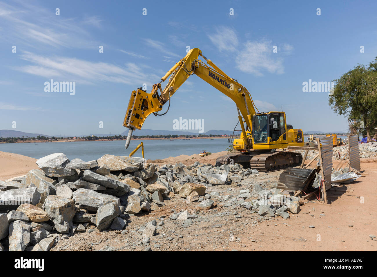 River bank protection works on the Mekong River with stone breaker ...
