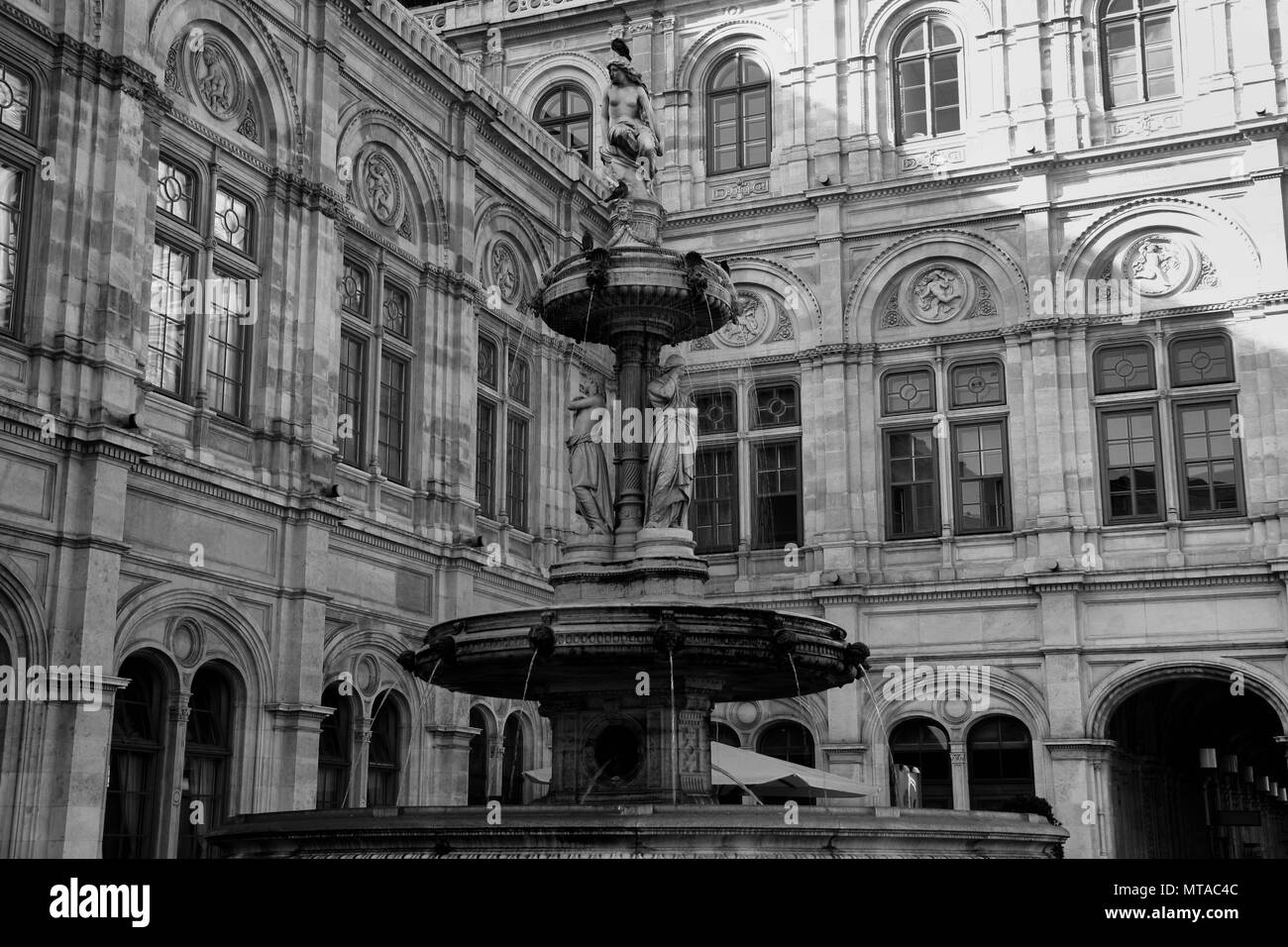 details of water fountain in front of The Vienna Opera house in Vienna ...