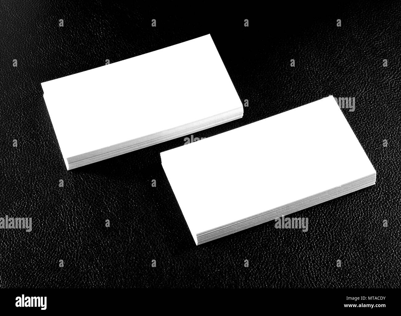 Businessman showing blank business card Black and White Stock Photos ...