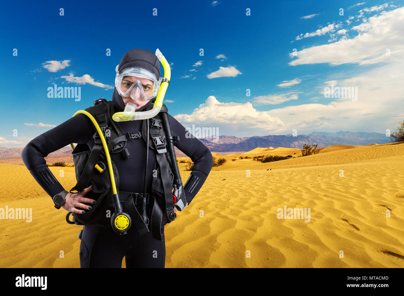 Woman diver standing hi-res stock photography and images - Alamy