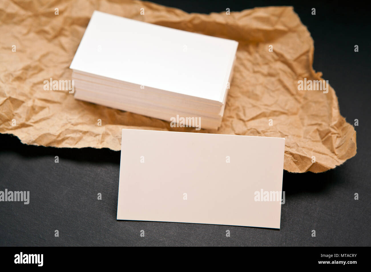 Blank business cards on a grey background, identity design, corporate ...