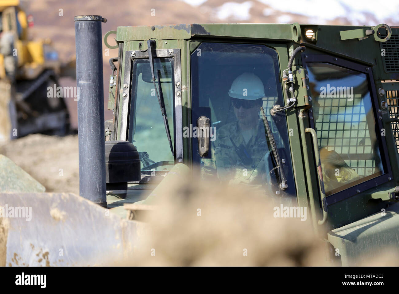 Alaska Guardsman Sgt. Jeffery Enderle, a horizontal equipment ...