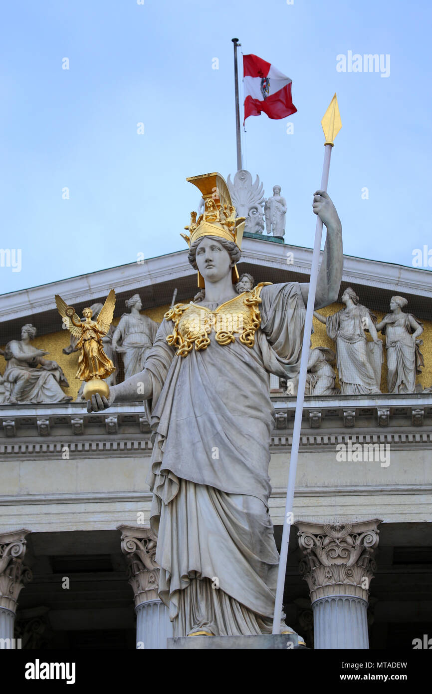 The Austrian Parliament and statue of Pallas Athena in Vienna, Austria ...