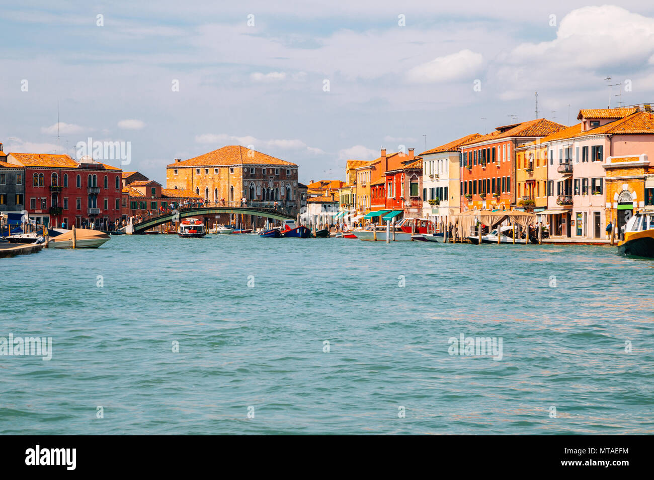 Colorful buildings and canal in Murano island, Venice, Italy Stock ...