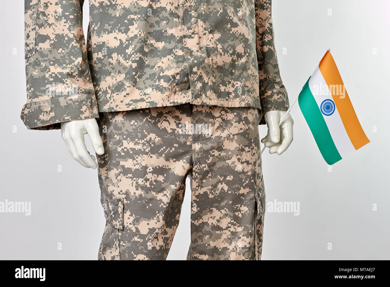 Mannequin soldier with indian flag. Cropped image. White isolated ...