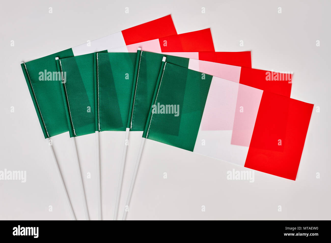 Gathering of Italian flags. Many Italy flags on white isolated ...