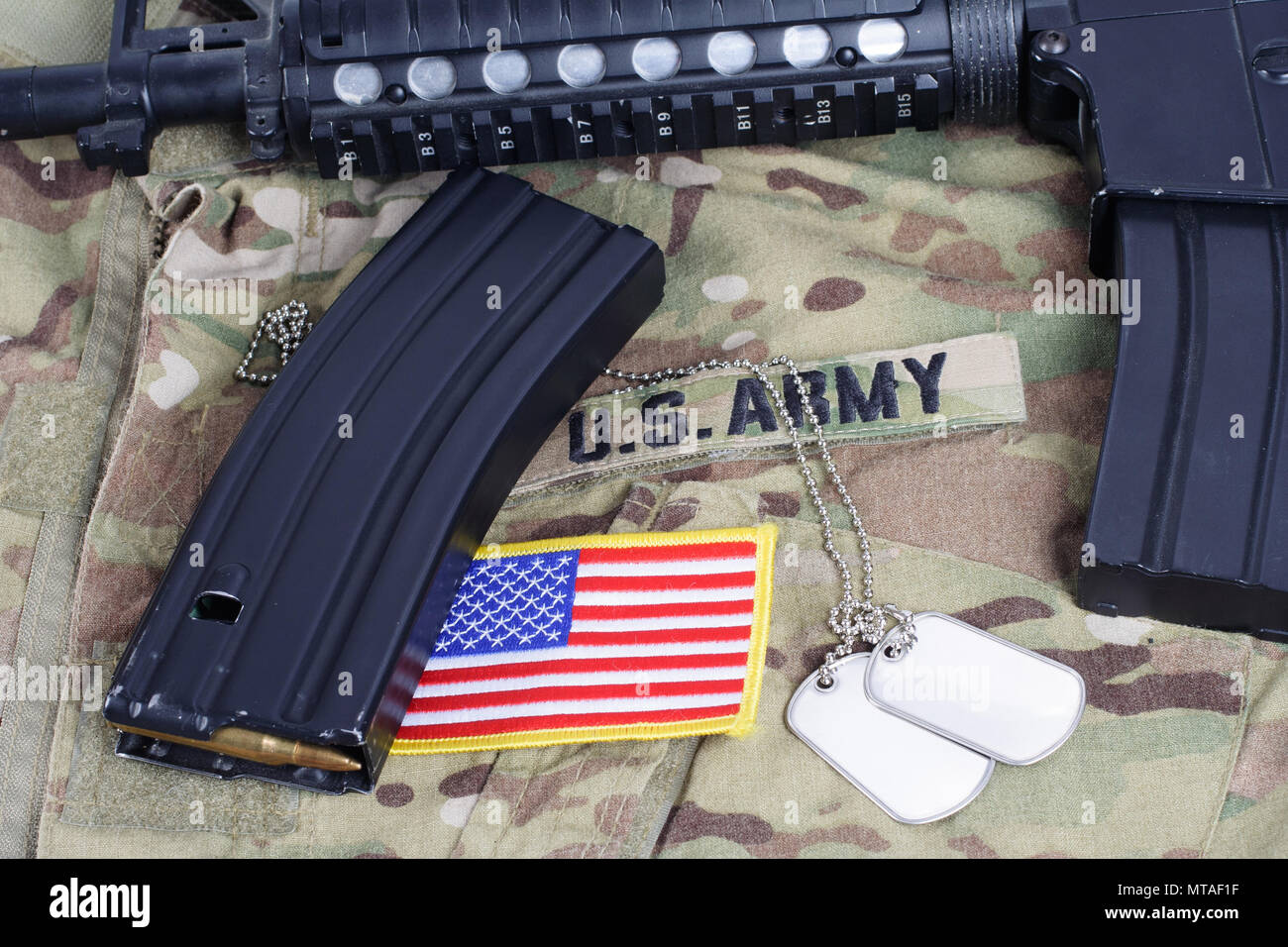 M4 carbine with ammunitions on US Army uniform Stock Photo - Alamy