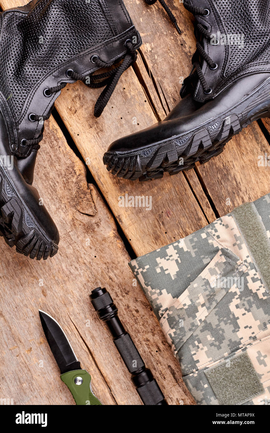 Flat lay essentials of military army clothes. Top view, flat lay. Old ...