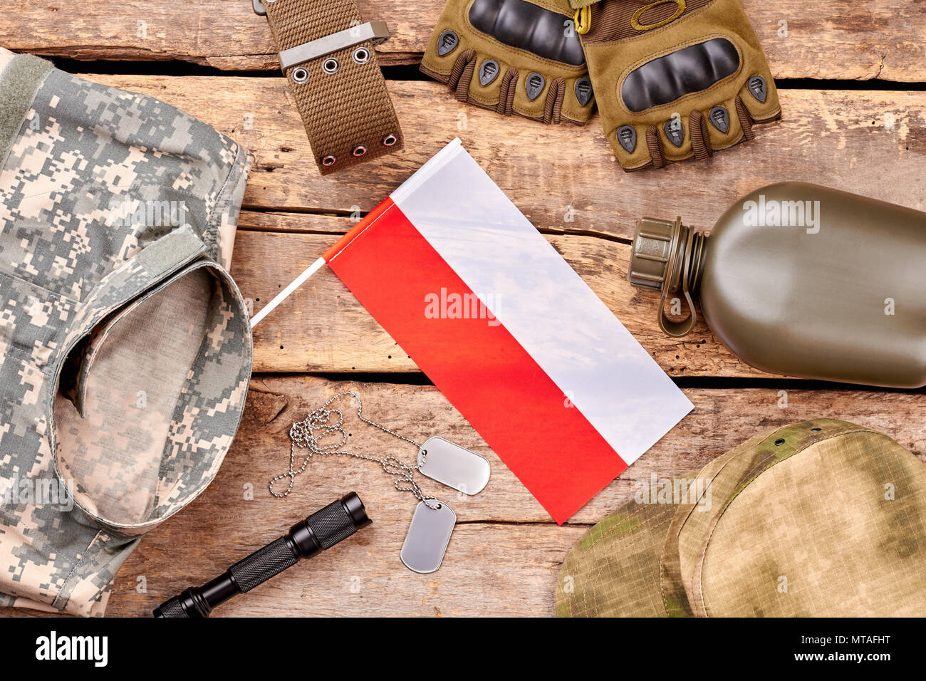 Poland army soldier items flat lay. Top view. Wooden background Stock ...
