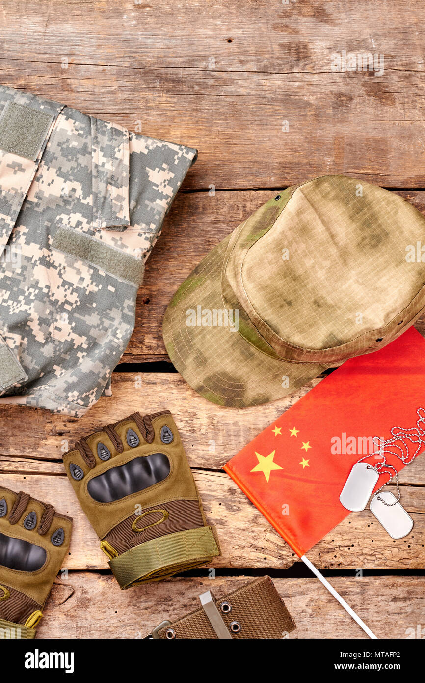 China army equipment flat lay. Top view, flat lay. Wooden background ...
