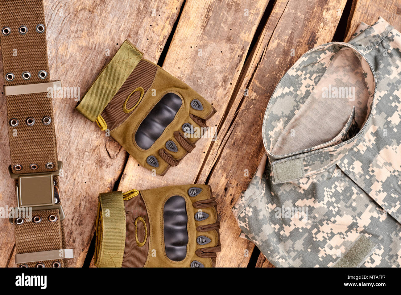 Military things essentials flat lay. Top view, soldiers outfit on wood ...
