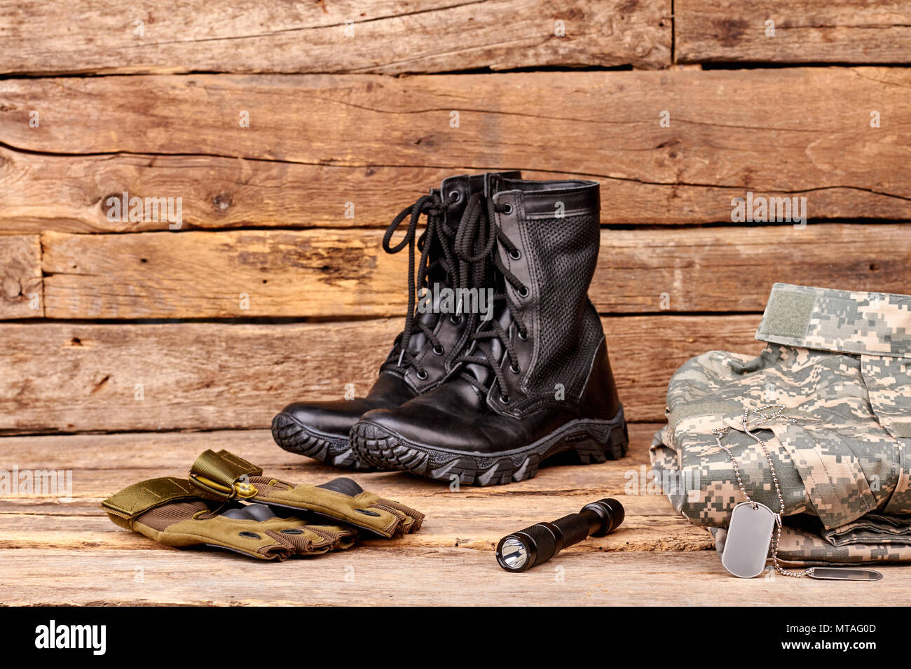 Military equipment on wood. Soldier essentials arrangement Stock Photo ...