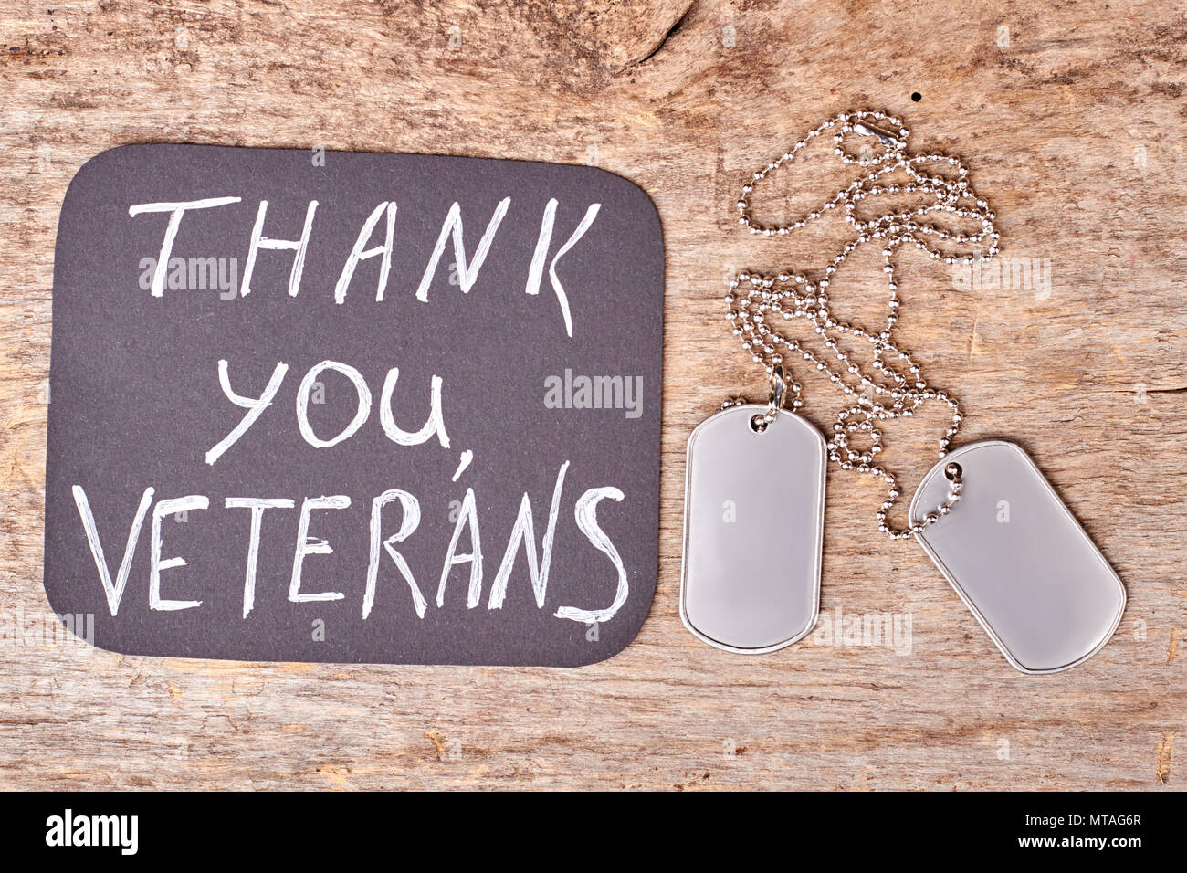 Thank you veterans, flat lay. Steel dog tags on wood, top view Stock ...