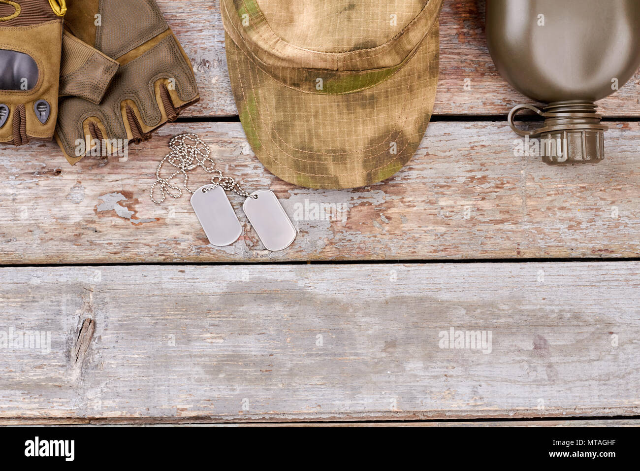 Soldier's attributes on wood. Flat lay, top view Stock Photo - Alamy