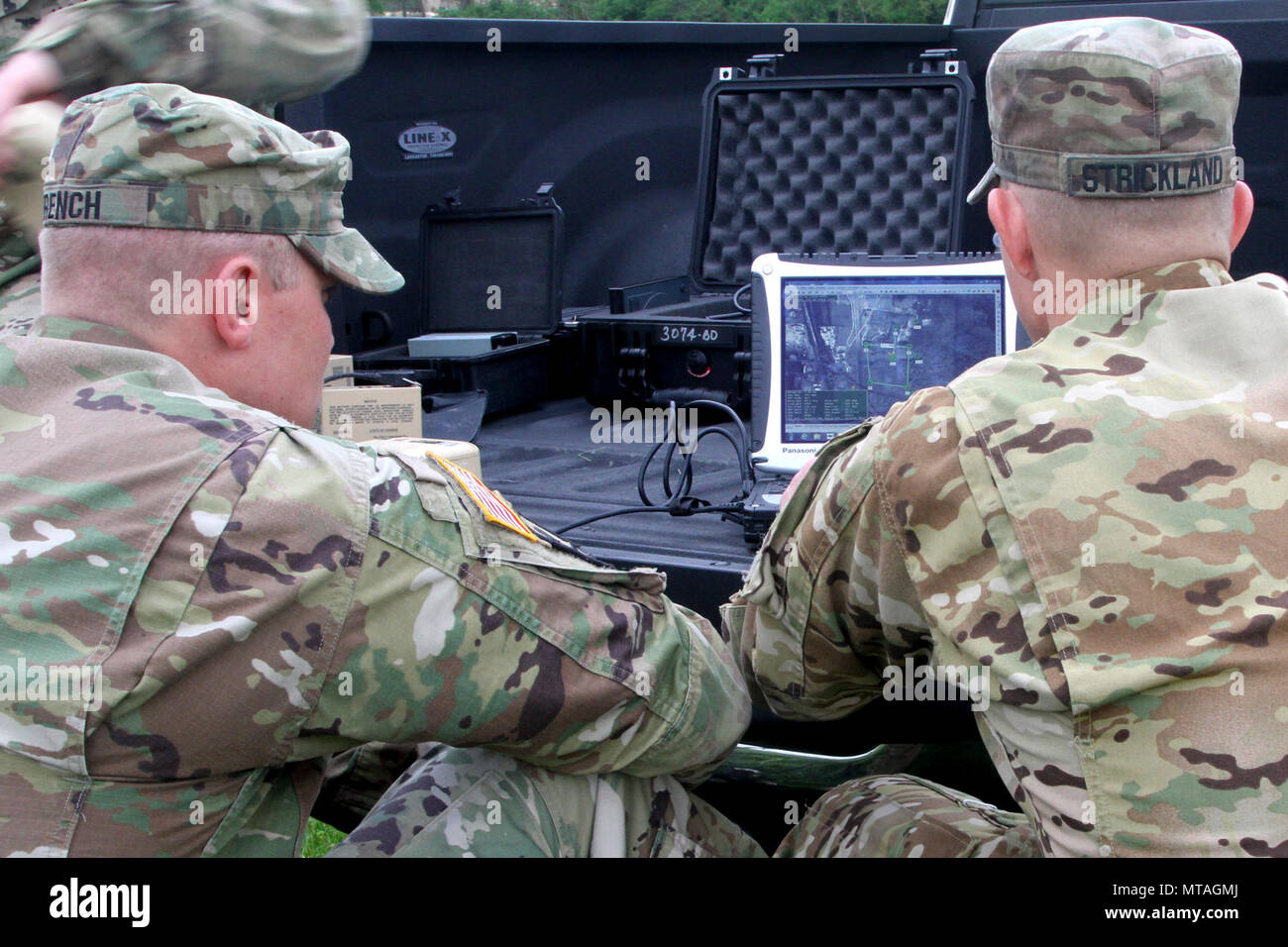 Sgt. Benjamin French (left), a Small Unmanned Aircraft System (SUAS ...