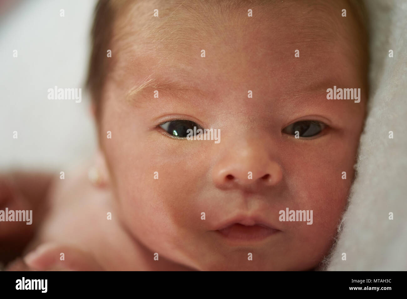 Infant face hi-res stock photography and images - Alamy