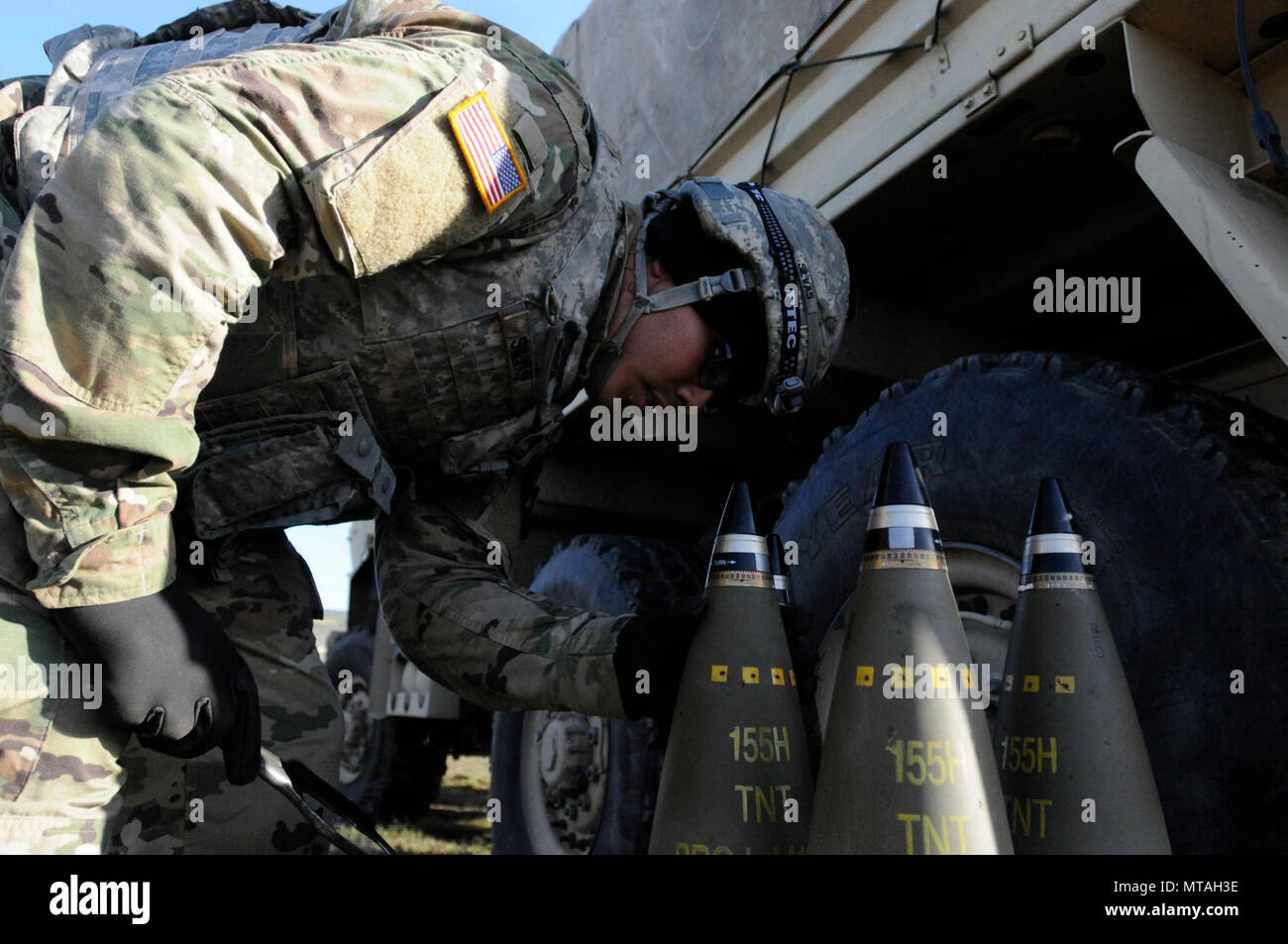 Pvt. Michael Silvas 2nd Battalion 17th Field Artillery Battery adjusts ...