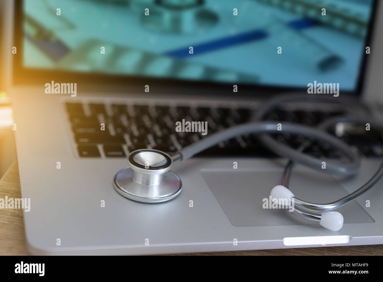 stethoscope on laptop Doctor working in hospital Healthcare and medical ...