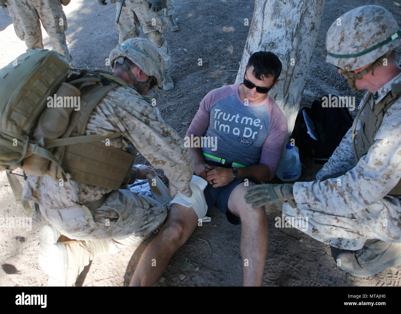 A U.S. Navy Corpsman with 2nd Battalion, 6th Marine Regiment provides ...